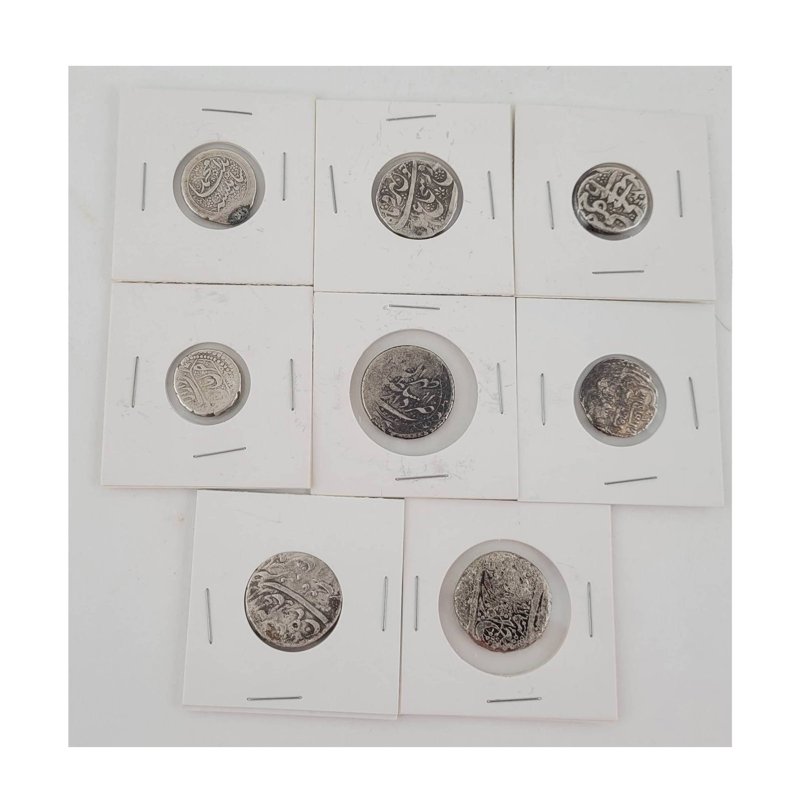 Eight Early Islamic Silver Coins Auction