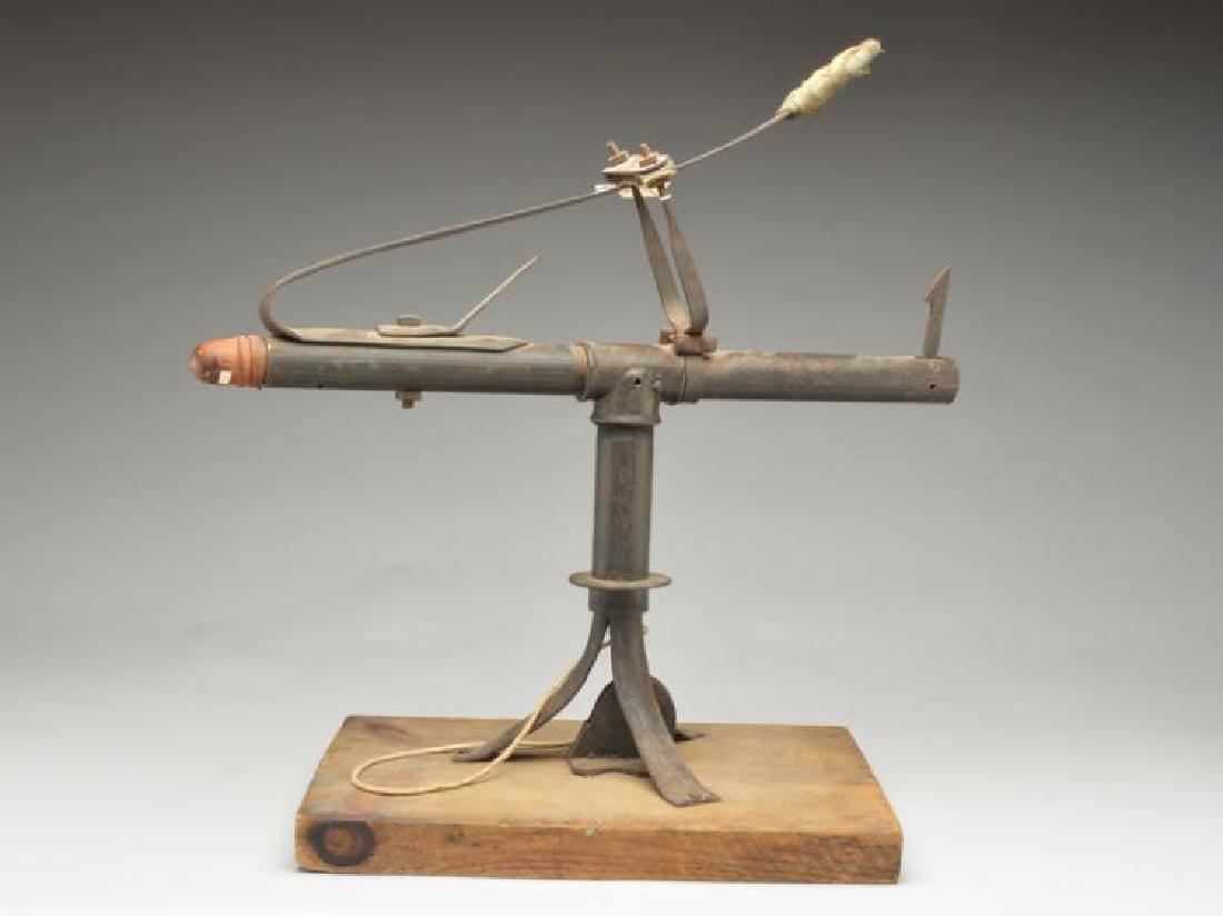 Glass target ball thrower, 3rd quarter 19th century.