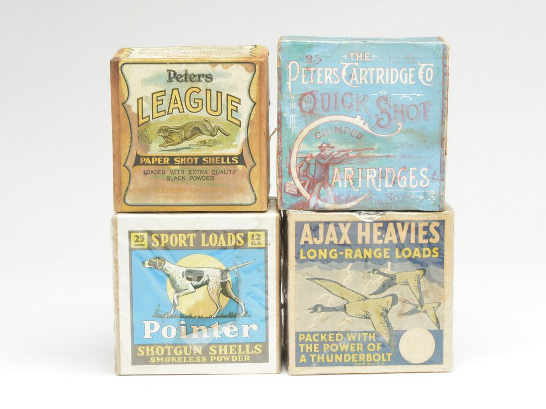 Four Shotgun Shell Boxes.