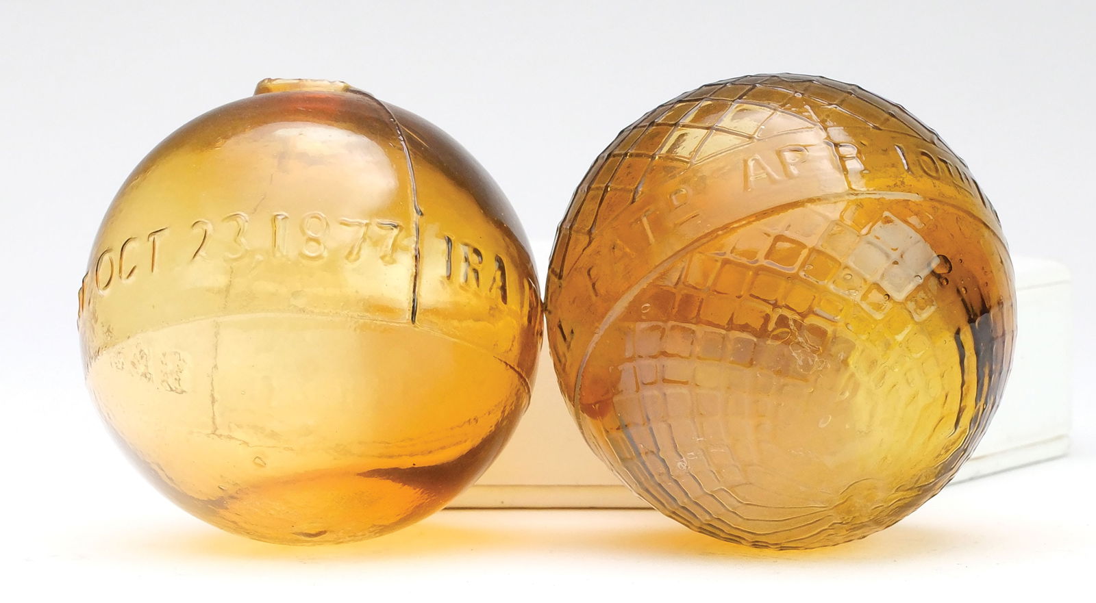 Two Glass Target Balls. Auction