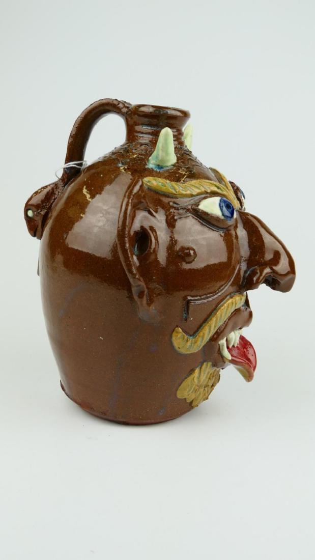 ALBERT HODGE (USA b1941) DEVIL FACE POTTERY JUG