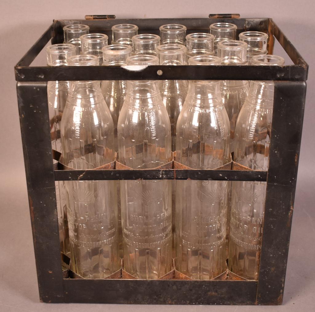 16 Shell Tall Oil Bottles In Metal Case