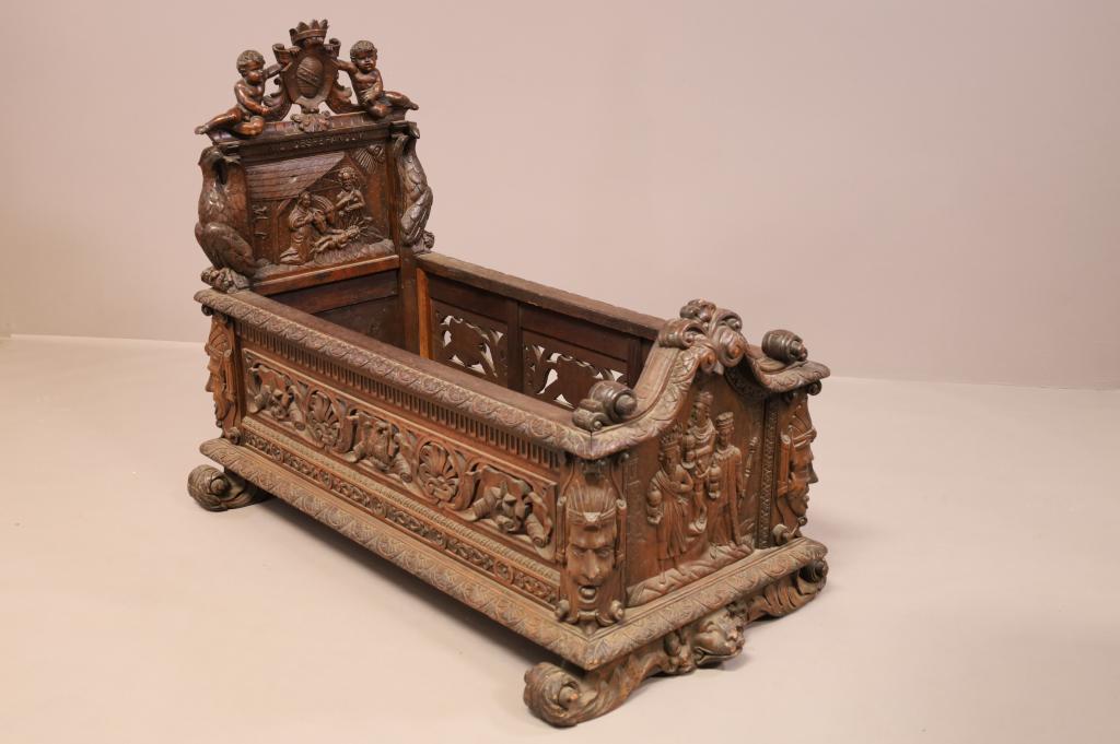 Highly Carved Antique Cradle Auction