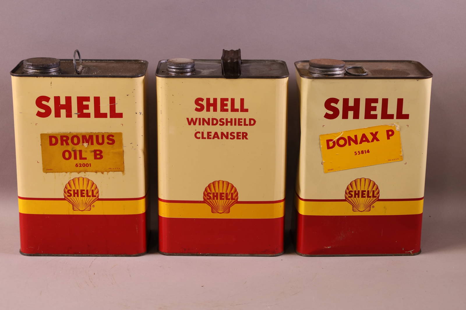 Three Shell Cans Auction