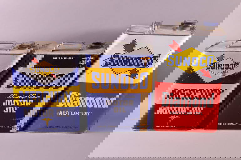 Three Sunoco Oil Cans