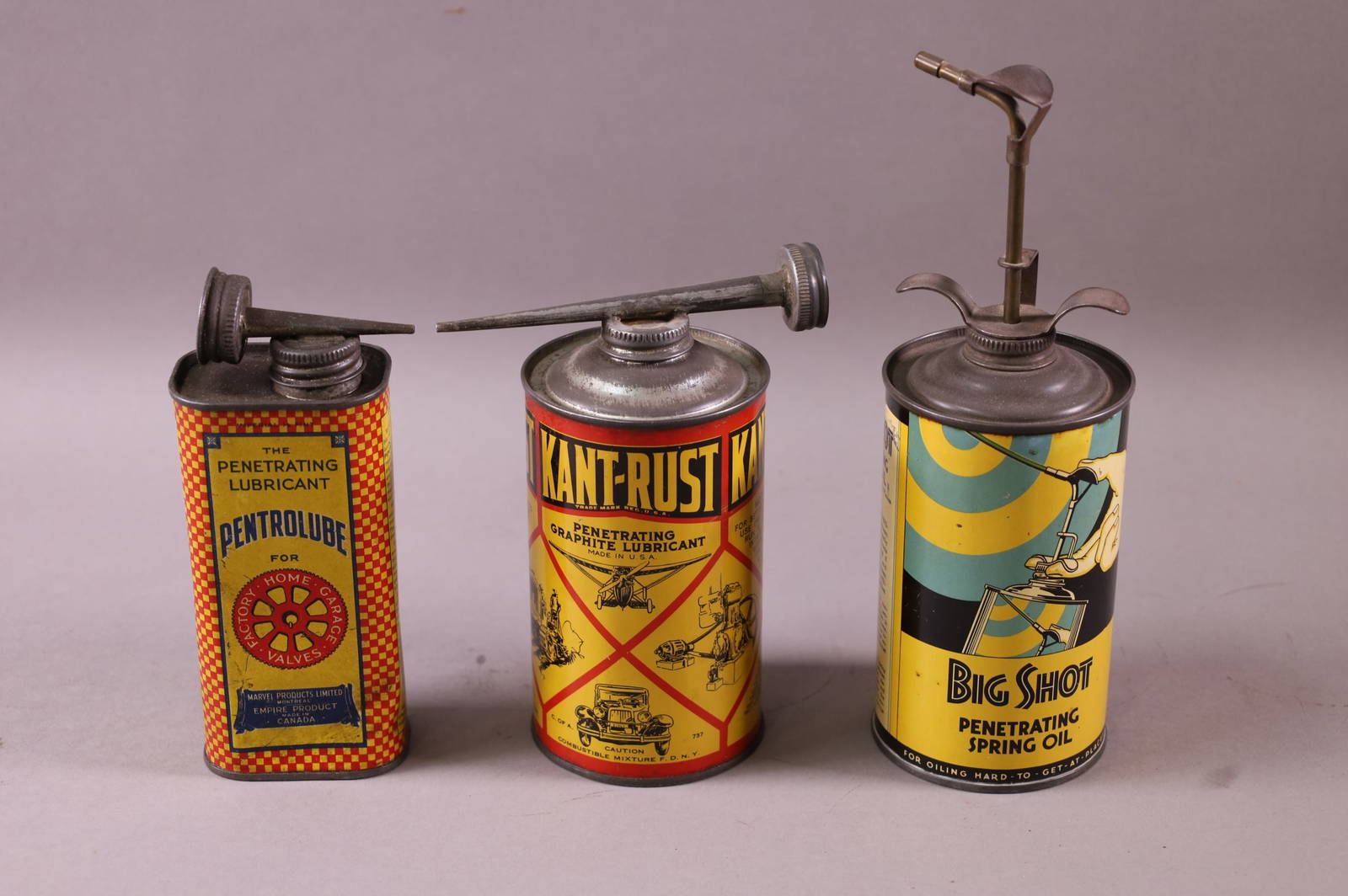 Three Lubricant Cans Auction