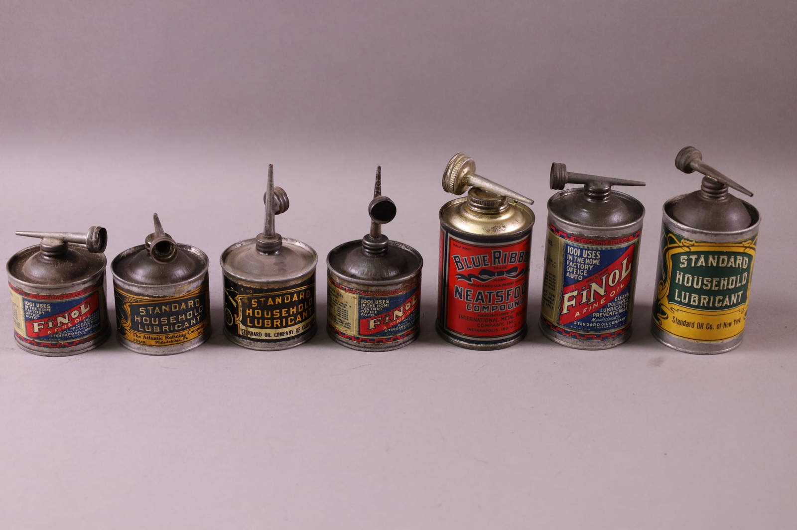 Seven Oiler Cans Auction