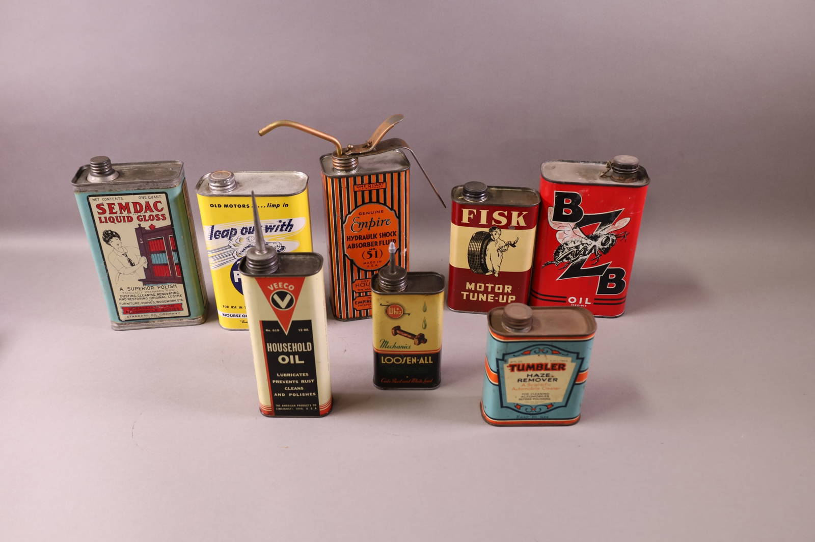 Eight Oil & Fluid Cans Auction