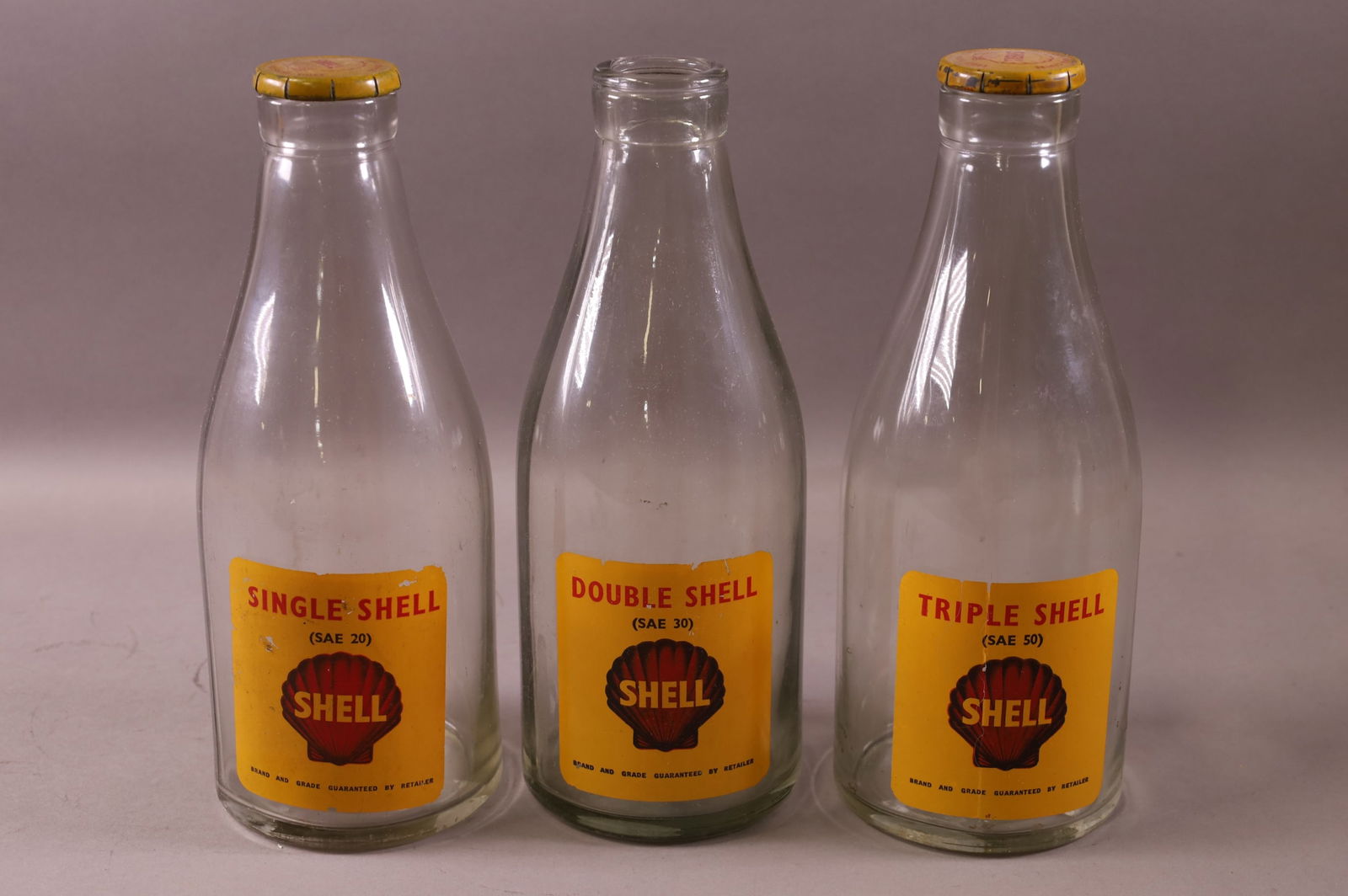 Three Shell Oil Bottles Auction