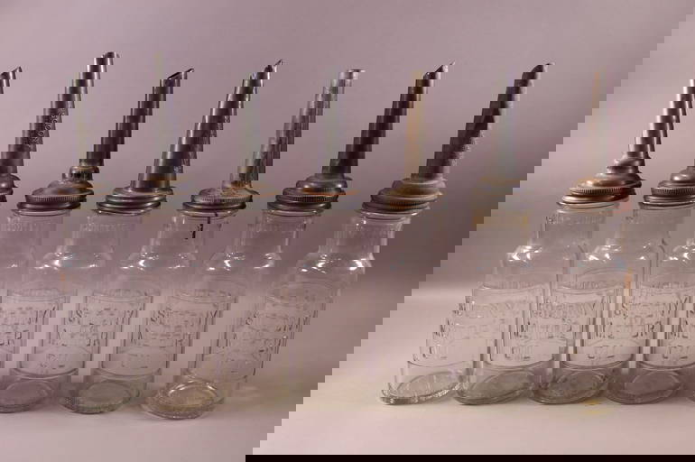 Seven Socony Oil Bottles
