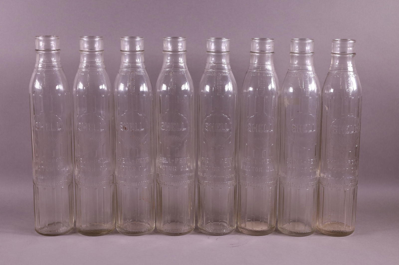 Eight Shell Penn Oil Bottles