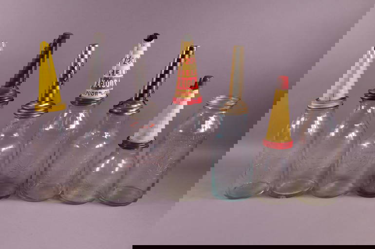 Seven Shell Oil Bottles