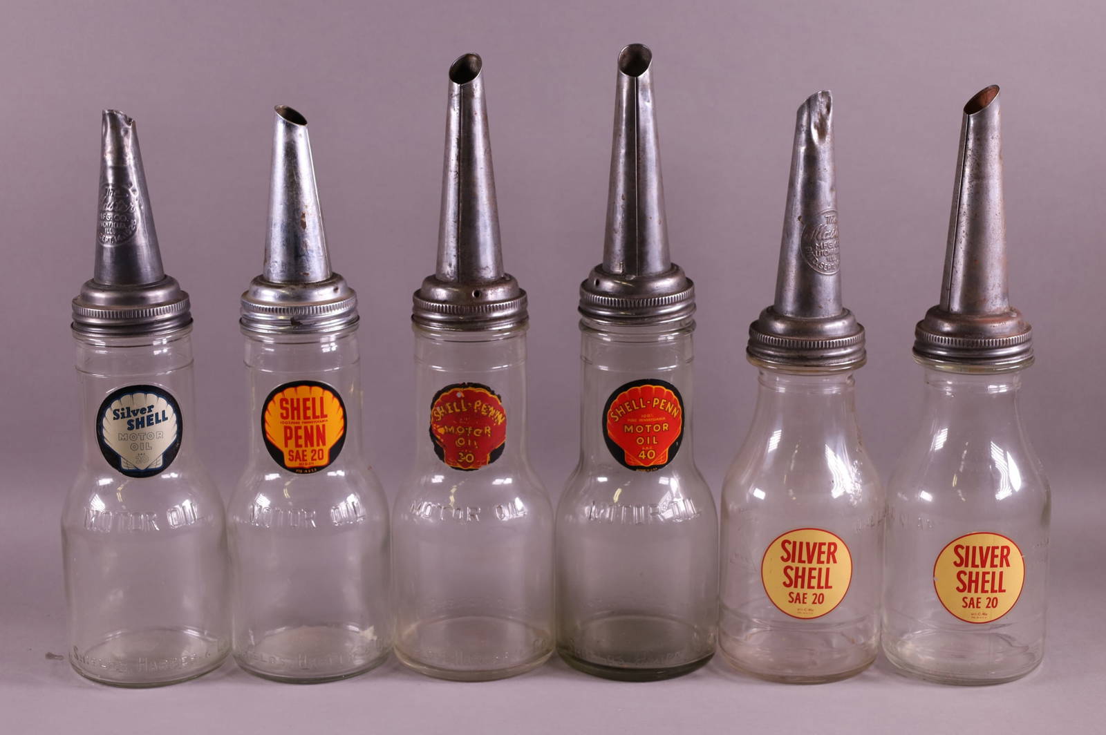 Six Shell Oil Bottles Auction