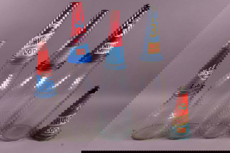 Four Ampol Oil Bottles