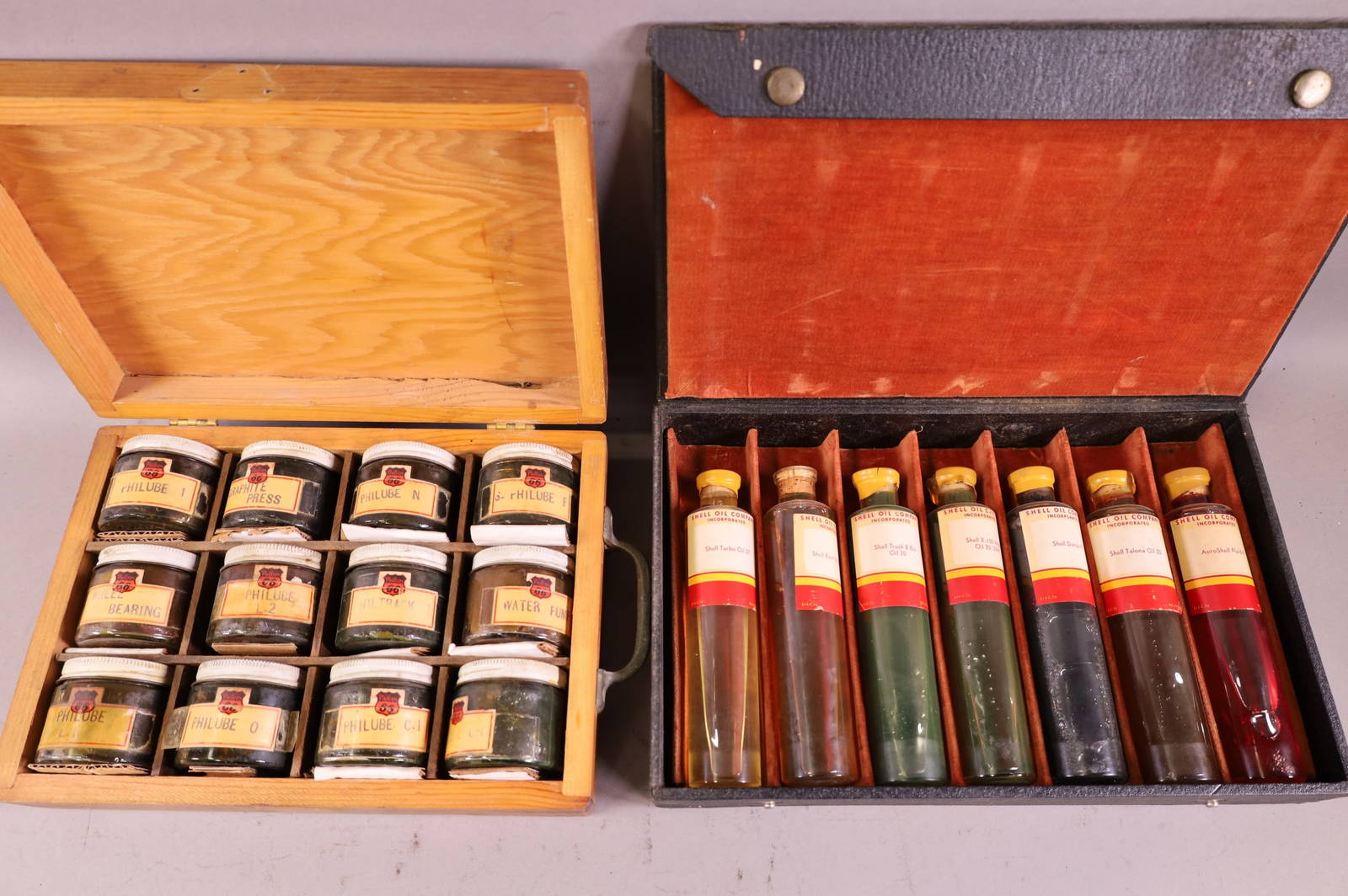 Two Salesman Sample Oil Bottle Sets Auction