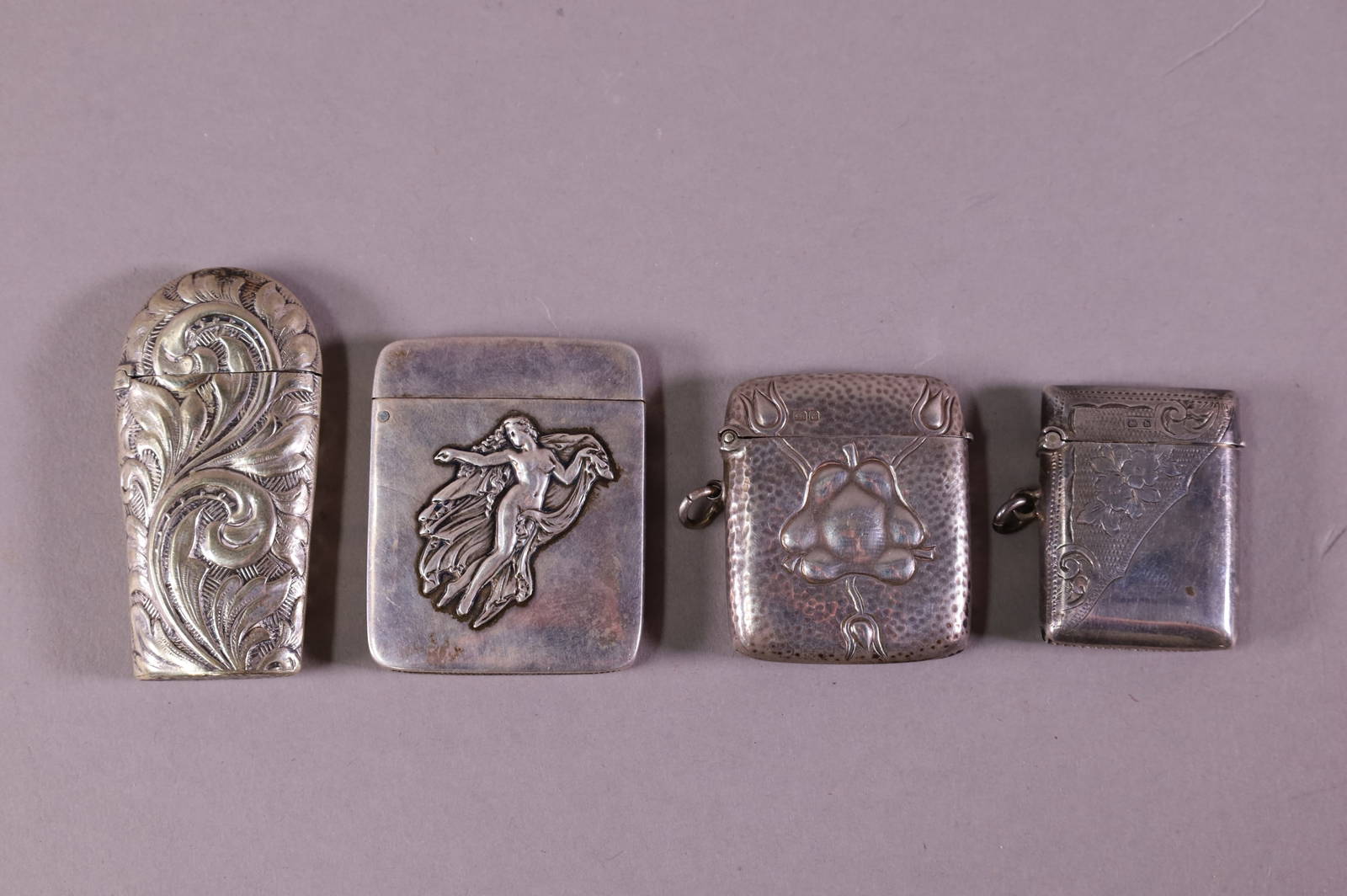 Four Sterling Silver Match Safes Auction