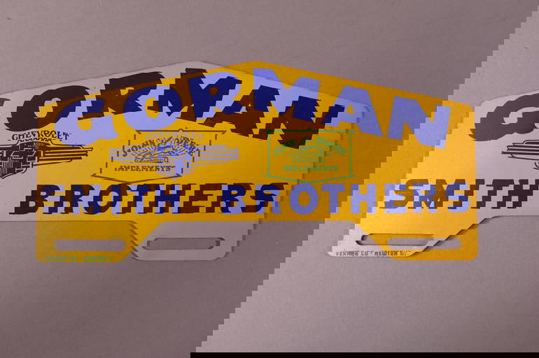 Gorman Smith Brothers Tin License Plate Topper