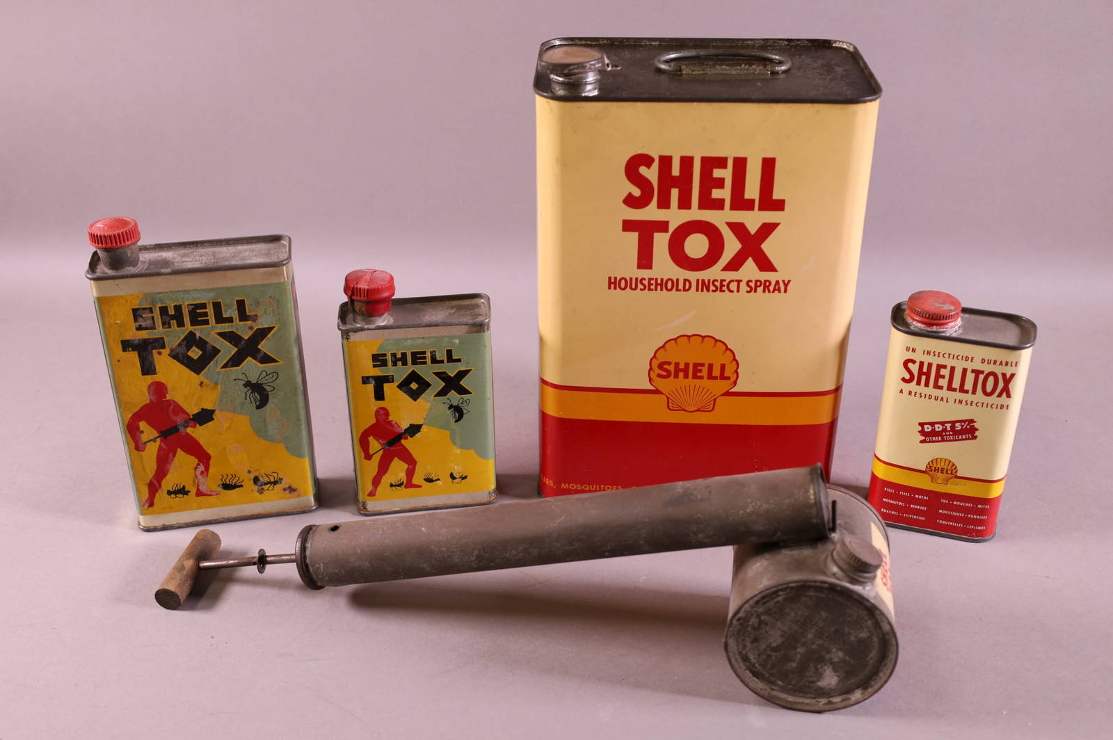 4 Shell Tox Cans & Sprayer Auction