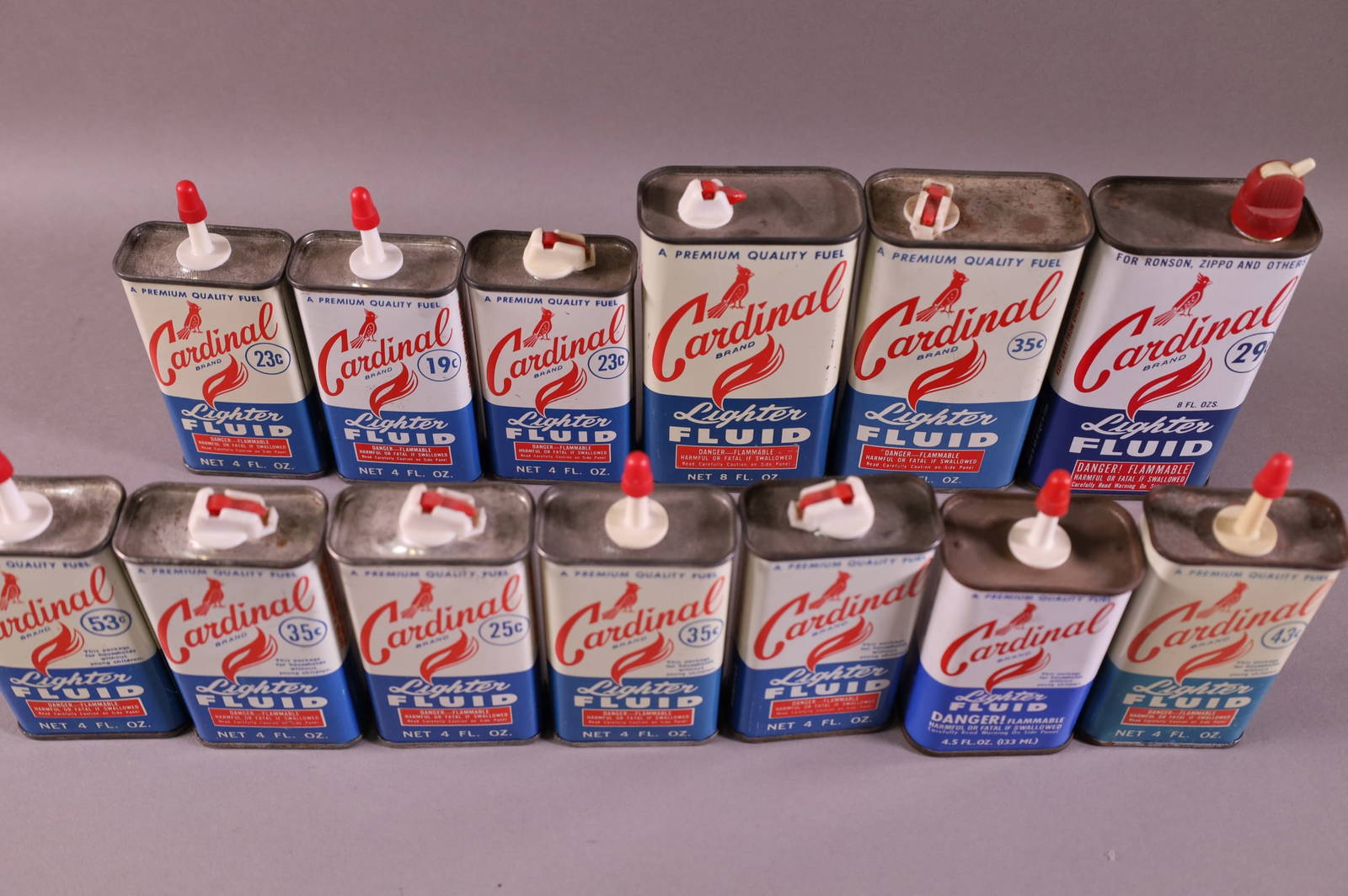 13 Cardinal Lighter Fluid Cans Auction
