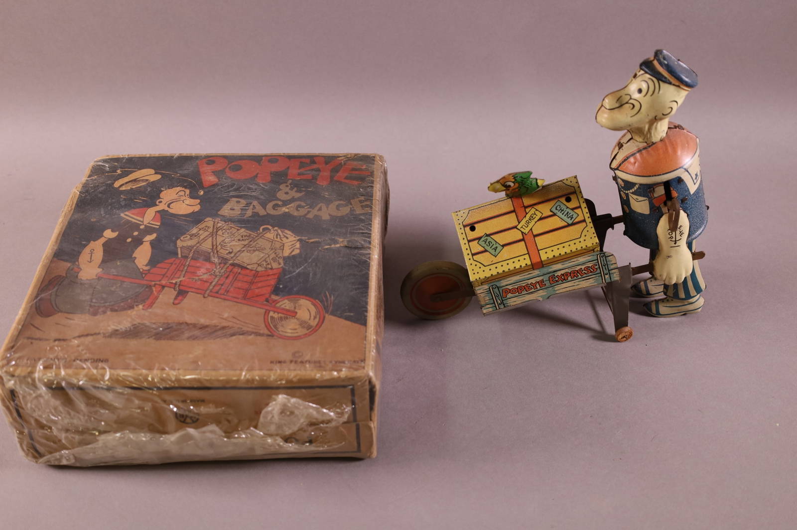 Marx Wind Up Tin Litho Popeye & Baggage Toy Auction