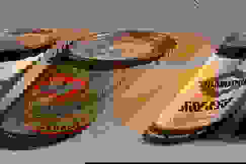 2 Grease Cans Auction