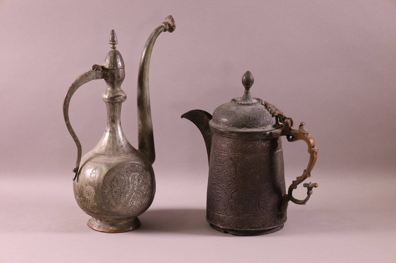 2 Middle Eastern Metal Pitchers Auction