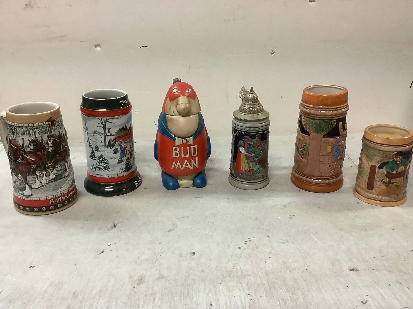 Lot Of Decorative Mugs And Budhead Auction