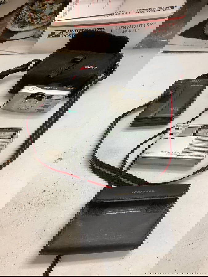 Canon Sure Shot Camera, Radio Shack Am/fm Stereo Casset Player, And ...