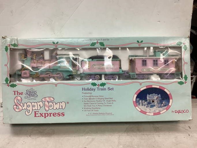 The Precious Moments Sugar Town Express Holiday Train Set