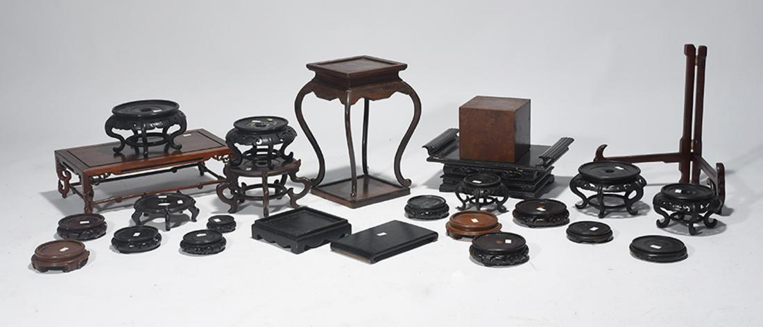 24 Chinese stands of various sizes, ages, and