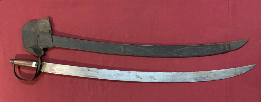 WOODEN HANDLED SABRE WITH LEATHER SHEATH. (#0303) on Jan 25, 2023 ...