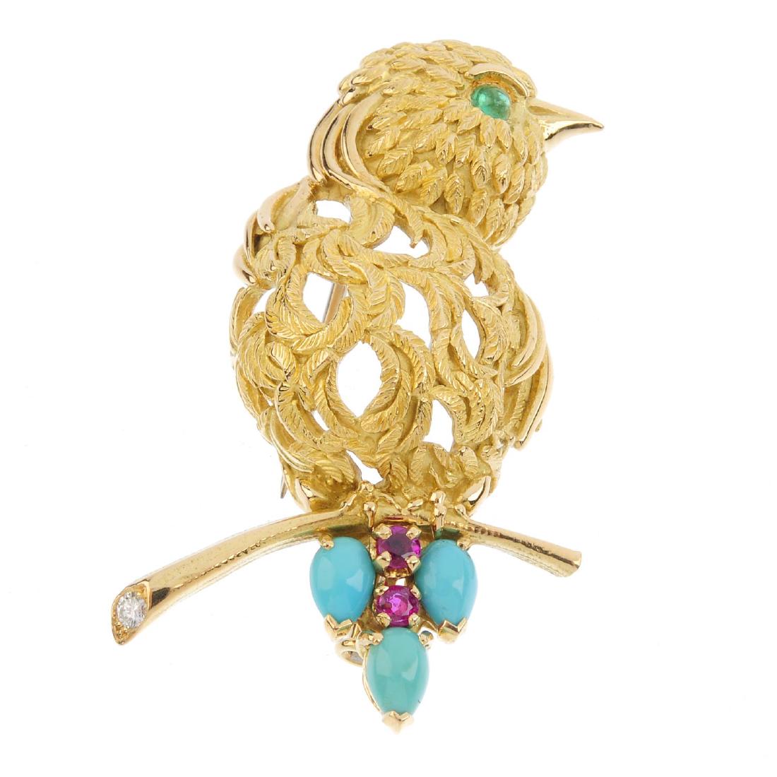 A 1950's 18ct gold diamond and gem-set bird brooch. The