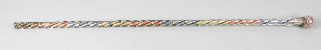 A 19th century clear glass frigger cane of wrythern