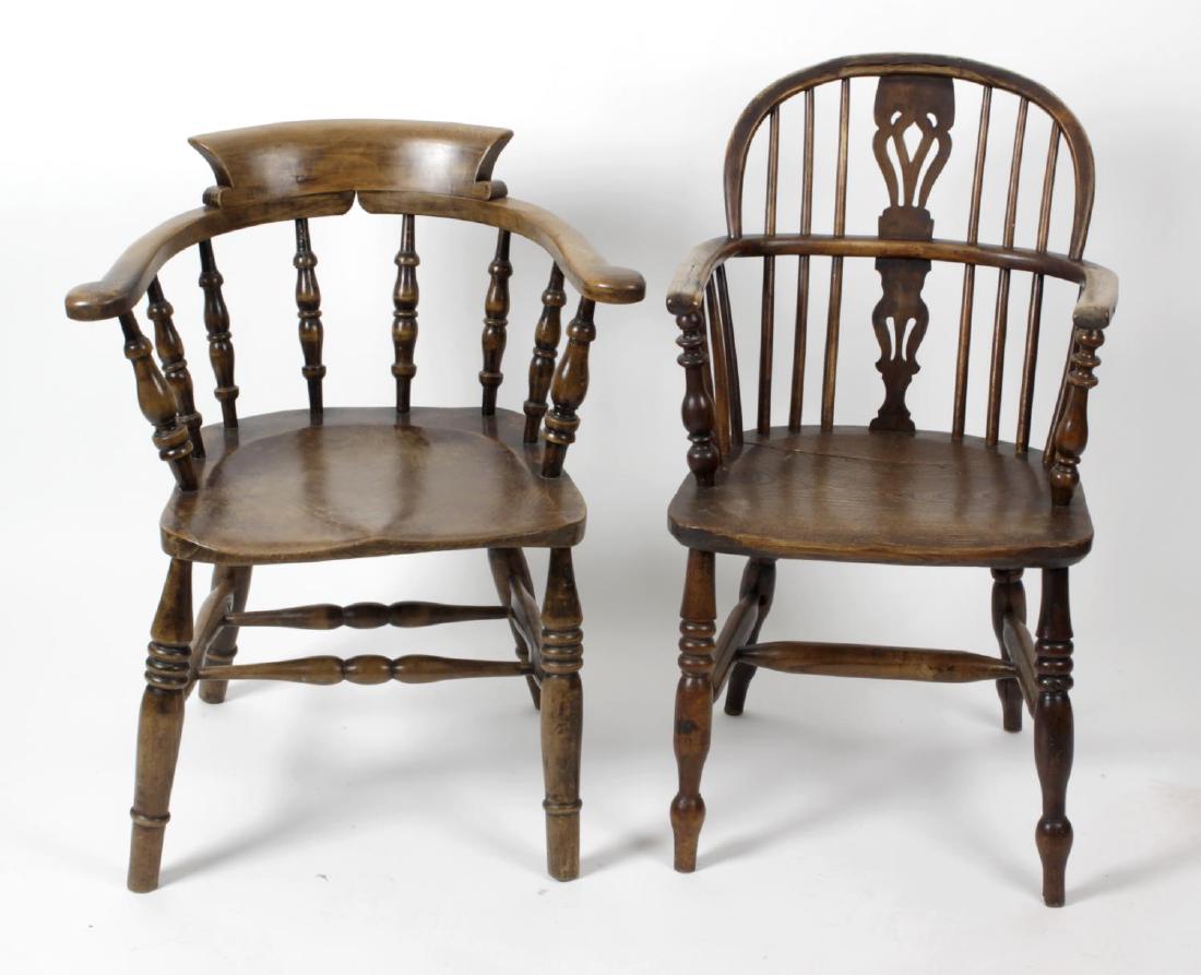 A 19th century elm and oak hoop back kitchen chair, the