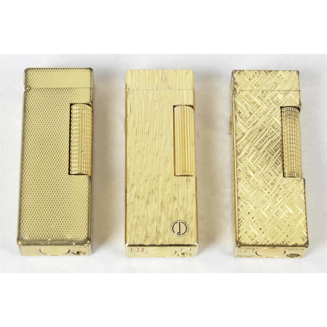 A Collection Of Six Dunhill Lighters. Auction