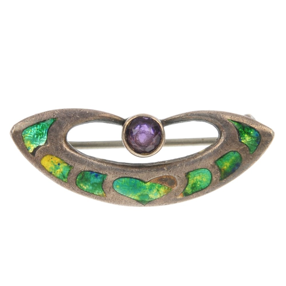 CHARLES HORNER - a silver enamel brooch.