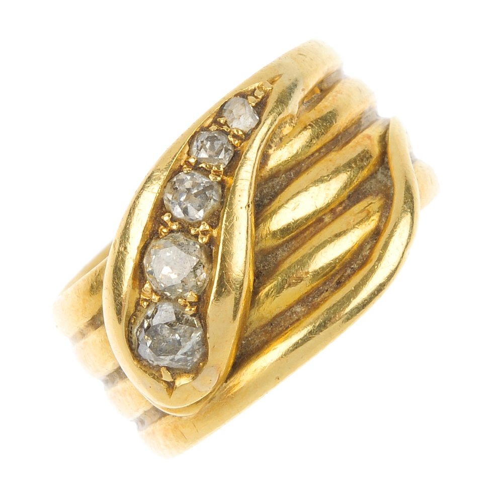 An early 20th century 18ct gold diamond snake ring.