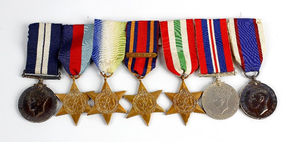 A group of seven medals.