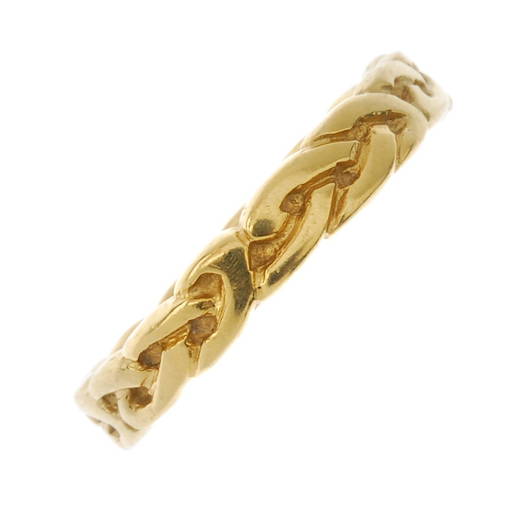 An 18ct Gold Band Ring. With An Engraved Interwoven