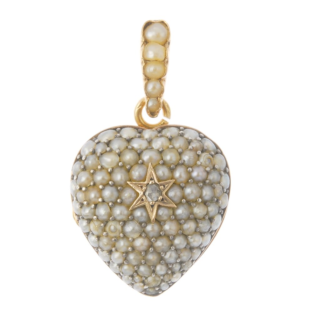 A late 19th century split pearl heart locket. The