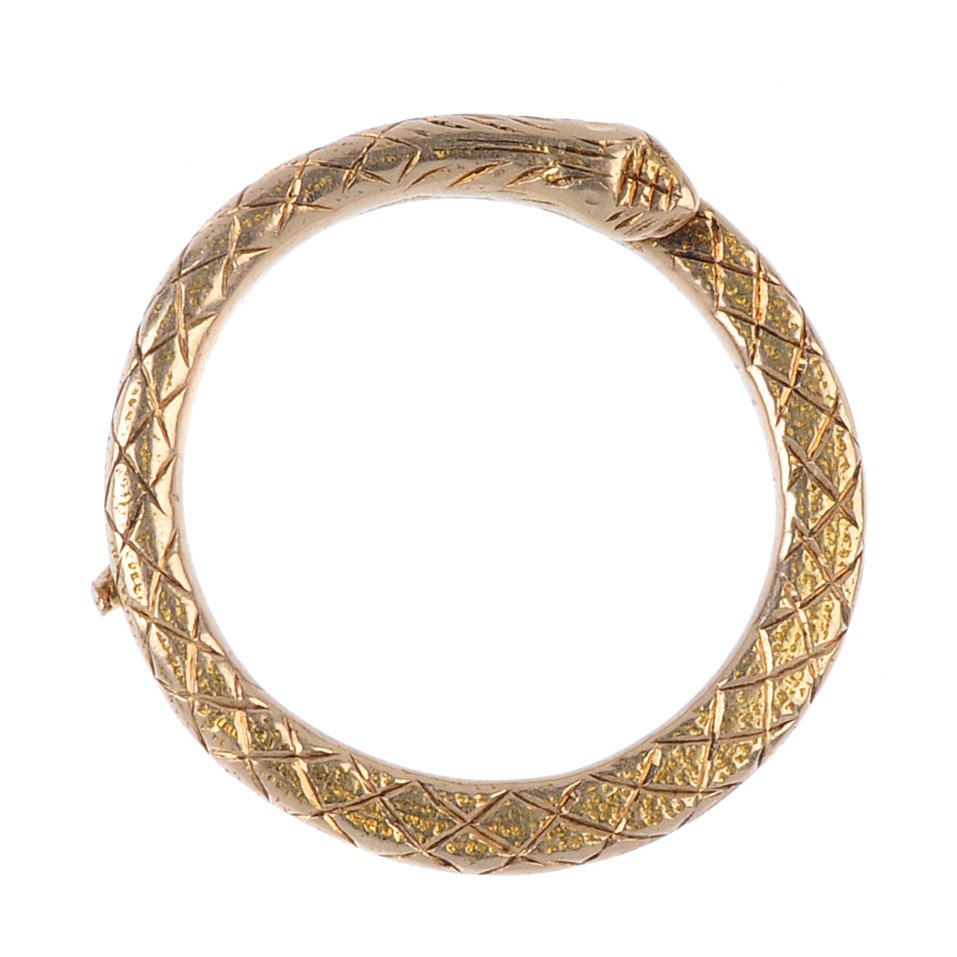 A mid Victorian gold ouroboros suspension loop, circa