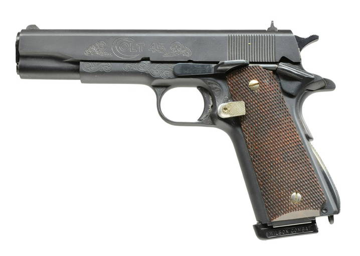 Engraved Colt Government Model Semi Auto Pistol.