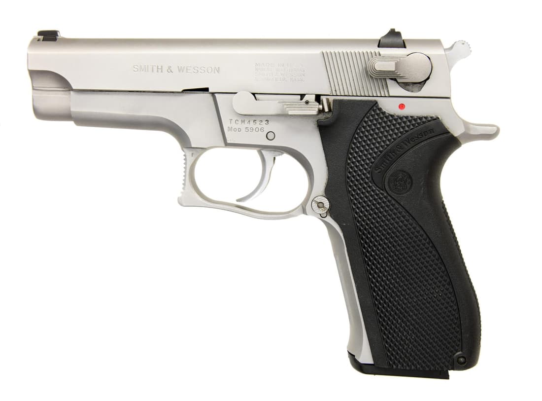 S&w Model 5906 Stainless Semi Auto Pistol. Auction