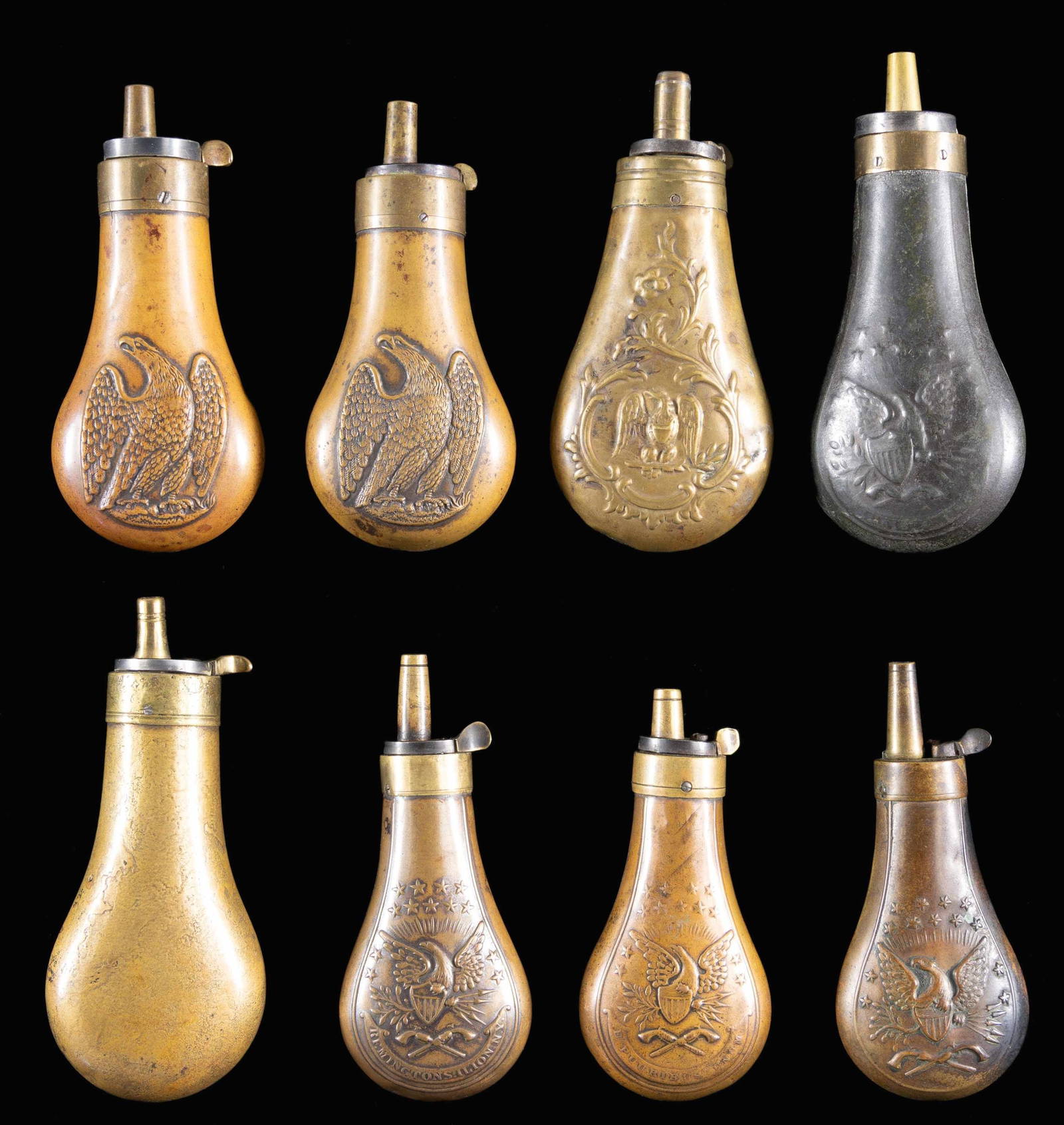 8 Pistol Powder Flasks. Auction
