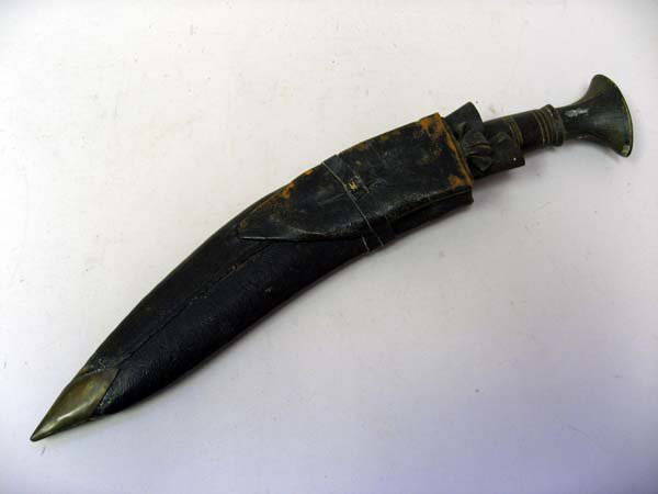 A Malay Curved Blade Knife