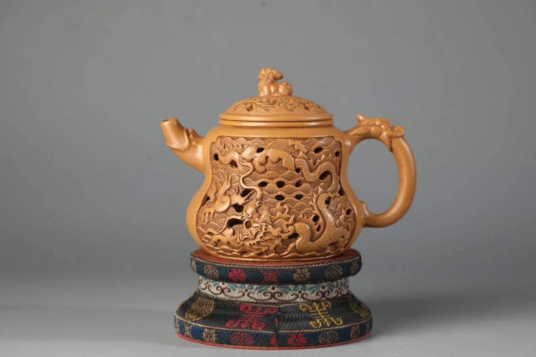 A Fine Reticulated Dark-red Enameled Pottery Auction