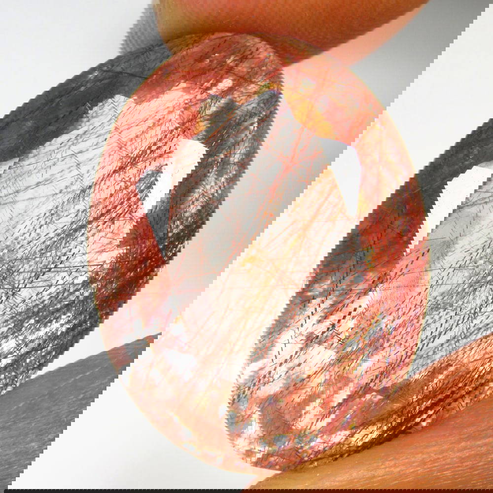 28.68 Ct Natural Rutile Quartz Oval Cut Auction