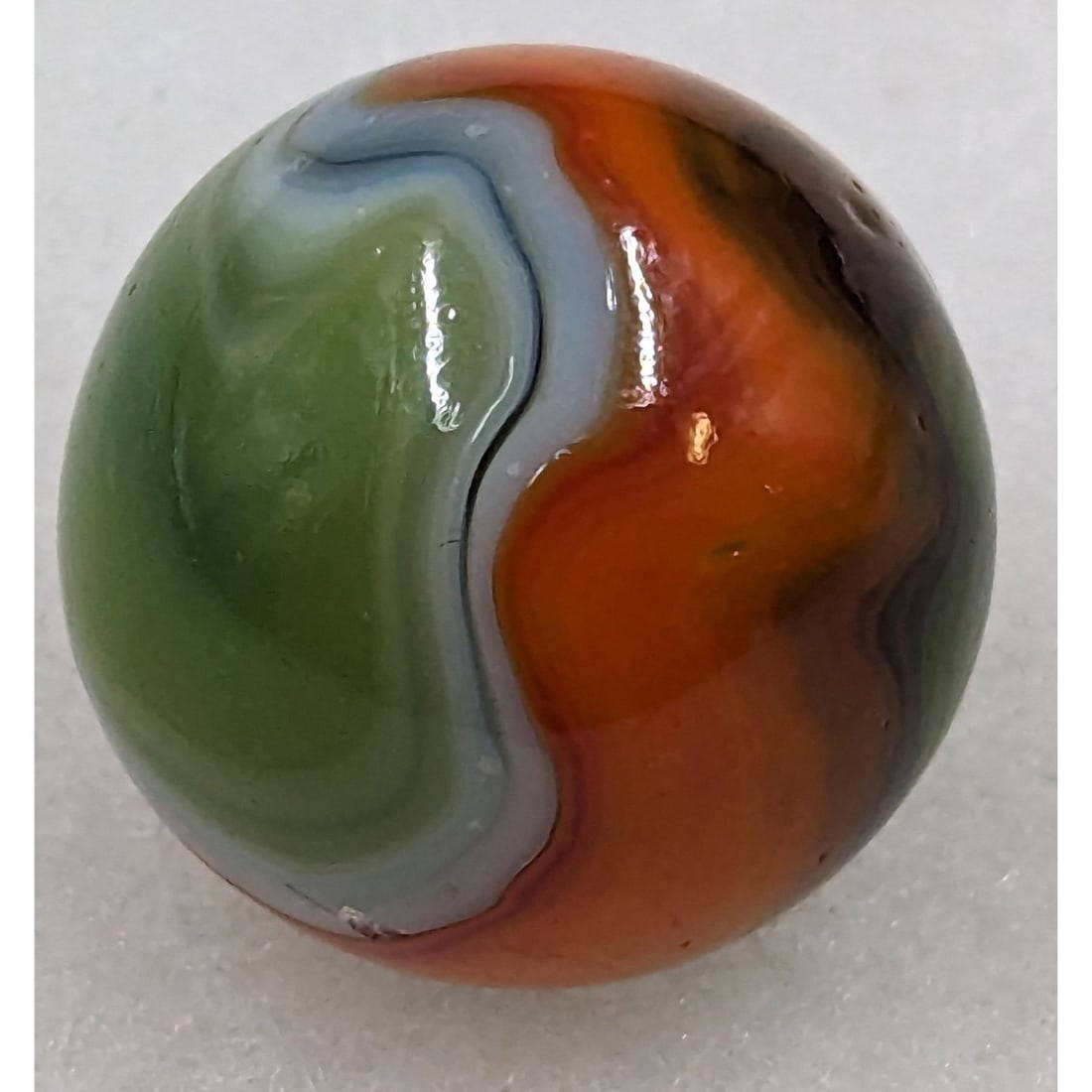 Marbles: Scarce Peltier Shooter Size Miller Machine Marble Auction