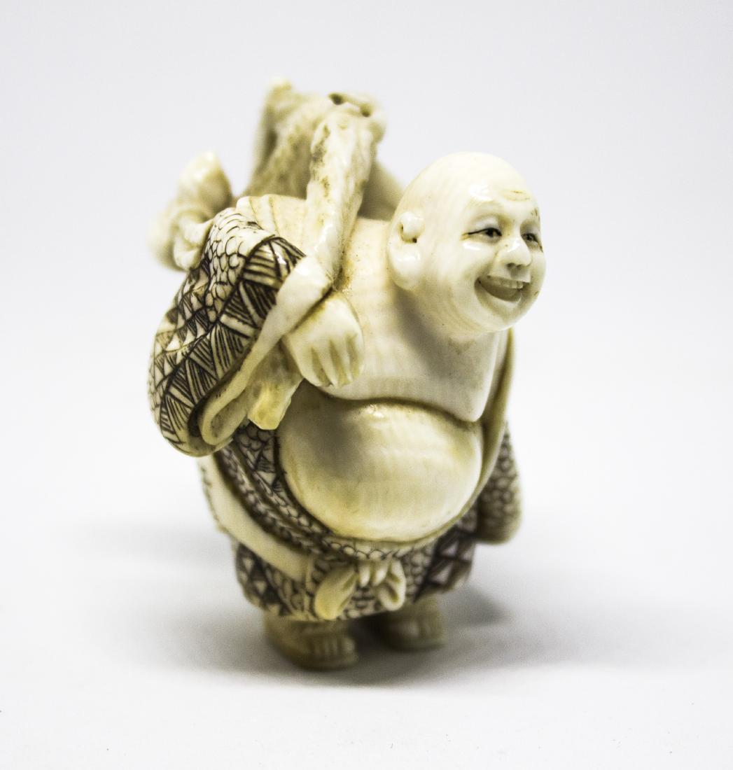 A Japanese bone Netsuke, Buddha