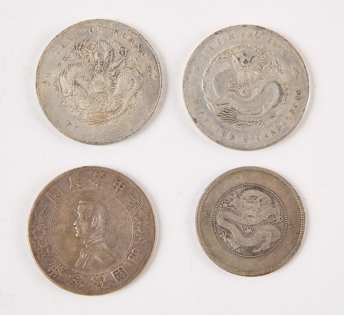 Four Silver Chinese Dragon Coins Auction